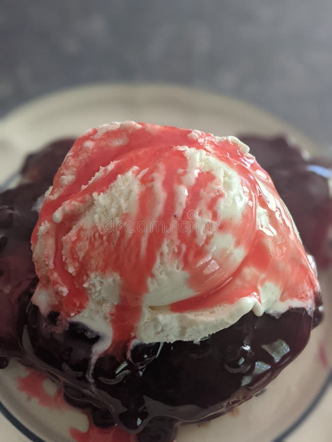 Blueberry Dumpling What Vanilla Ice Cream with Strawberry Syrup Stock ...