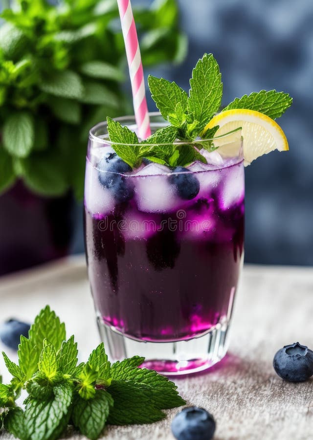 Blueberry Mint Lemonade in a Glass with a Background of Fresh ...