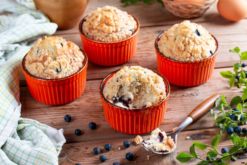 Blueberry Muffins with Powdered Sugar and Fresh Berries on the Table ...