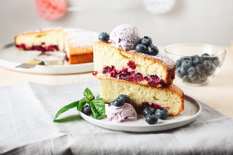 Blueberry Sponge Cake with Berry Ice Cream Stock Image - Image of ...