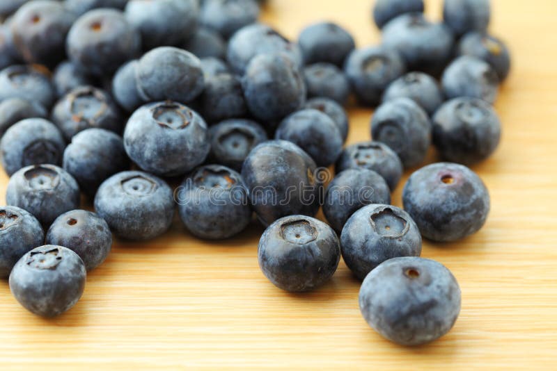 Blueberry on wooden table stock photo. Image of brown - 31406512
