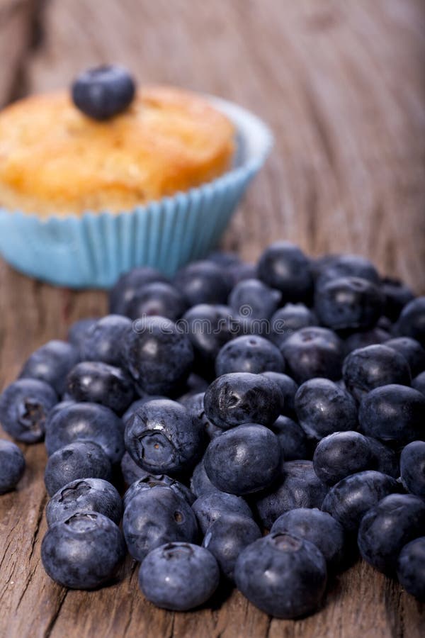 Blueberry on wooden table stock photo. Image of muffins - 30821682