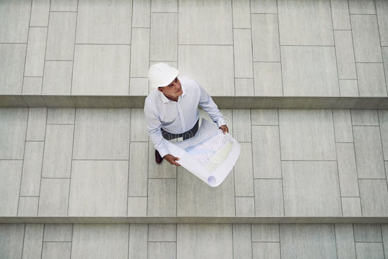 Blueprint, Architect and Top View of Man at Construction Site for ...