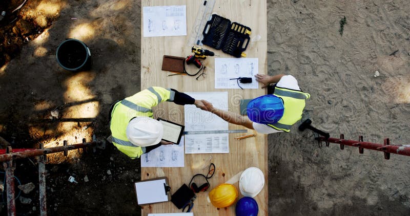 Blueprint, Construction and Men at Table with Handshake, Collaboration ...