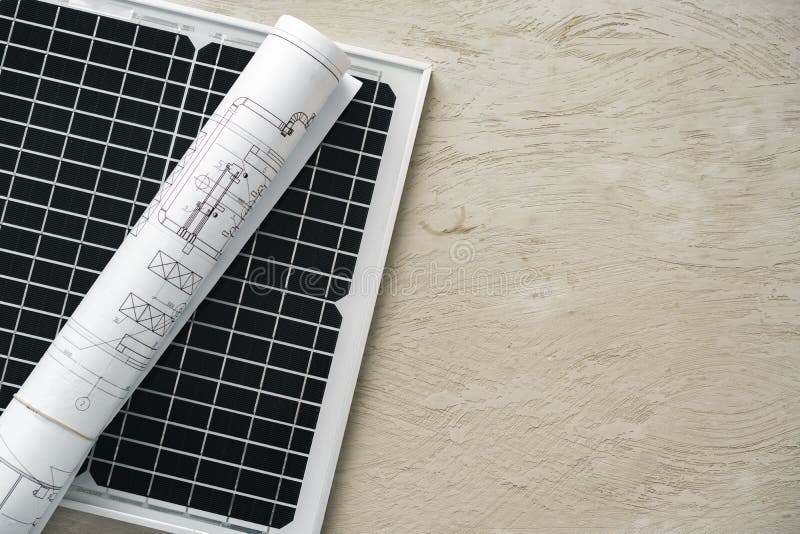 Blueprint Roll and Solar Panel, Home Project Stock Image - Image of ...