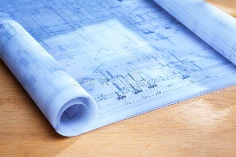 Blueprint on wooden desk stock image. Image of working - 20198033