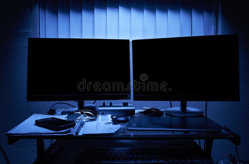 Two Blank Computer Monitors in a Dark Blue Room Stock Photo - Image of ...
