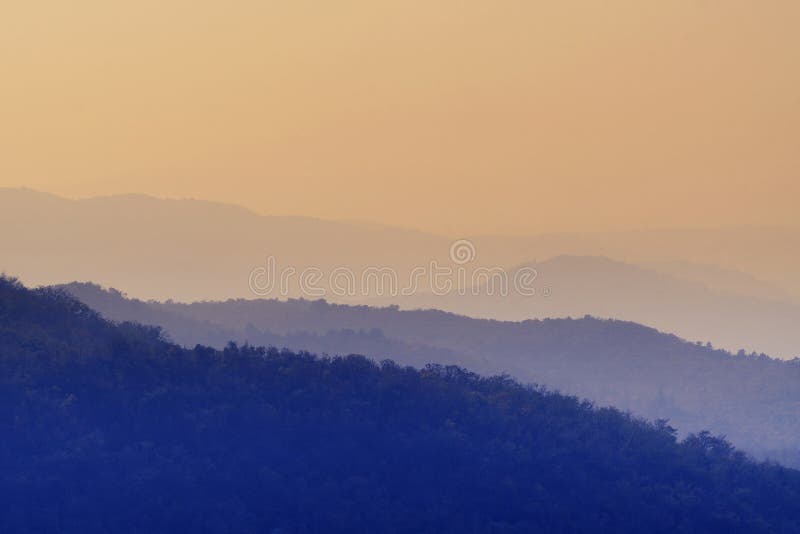 Bluish Colored Hazy Layers of Hills at Sunset Stock Photo - Image of ...