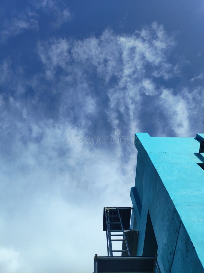 Bluish Water Tower Under the Bright Blue Sky Stock Photo - Image of ...