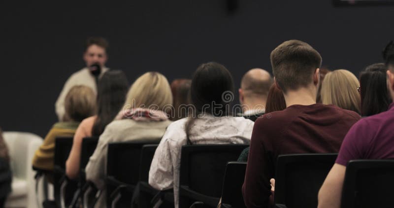 Student Science Conference at University Campus, Man Speaker Talking ...