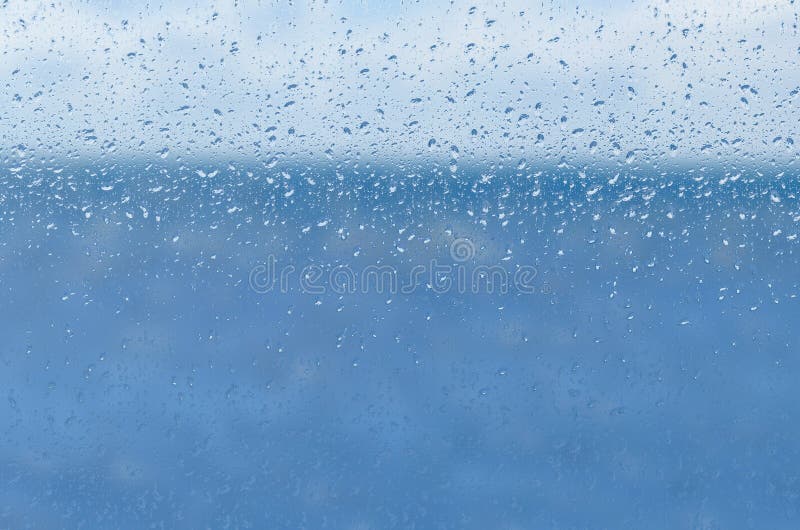 Blur Blue Water and Sky through Transparent Rainy Window Stock Image ...