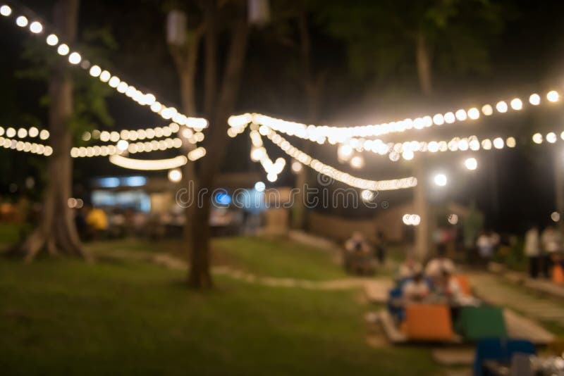 Blur Image of Outdoor Park Restaurant with Light Up Decoration Stock ...