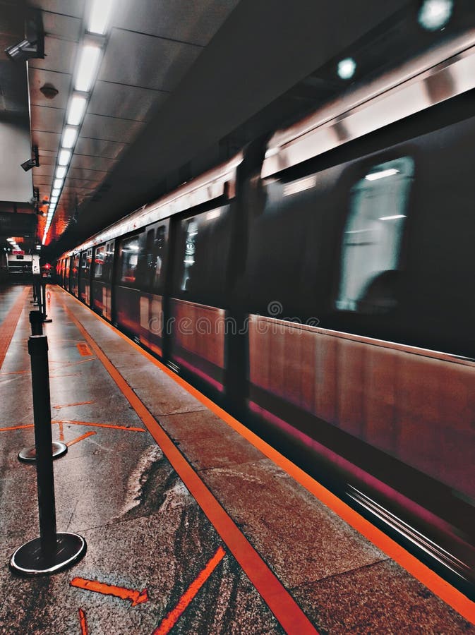Blur Shot of a Train Moving Past a Platform on a Station Stock Photo ...