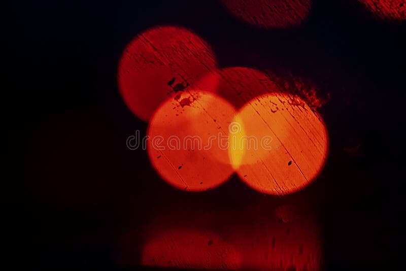 Blurred Abstract Background Reflection of Red Headlights at Night in ...