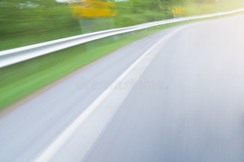 Blurred Asphalt Curve Road in Motion Blur Driving Fast for Background ...