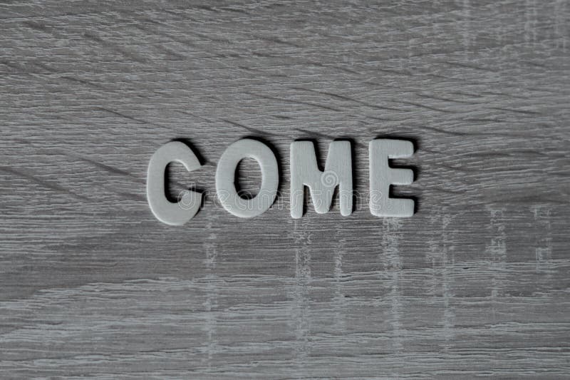 Blurred Background. Letters on Wooden Table. `Come` Stock Photo - Image ...