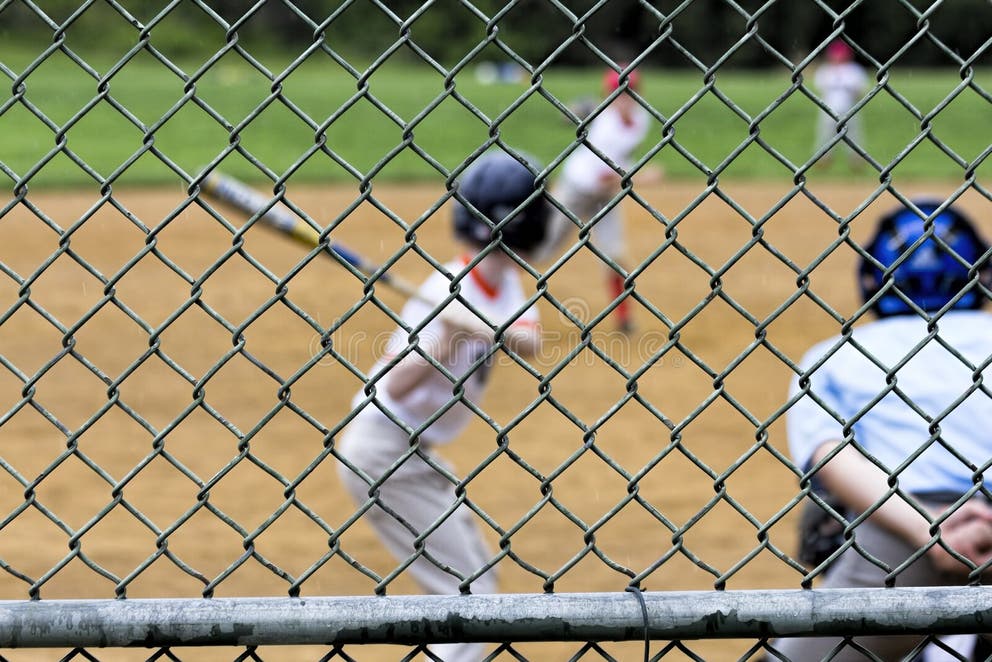 Blurred Baseball Game through Backstop Stock Image - Image of baseball ...