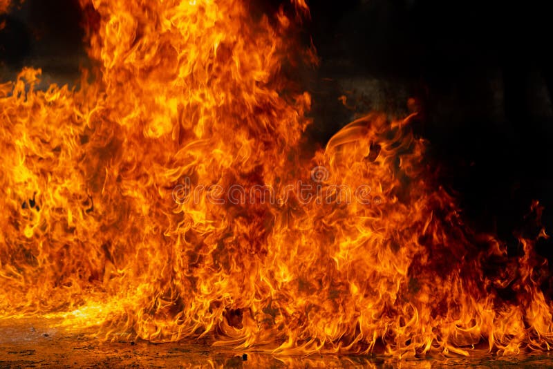 Blurred Bright Red and Orange Firestorm Texture on Black Background ...