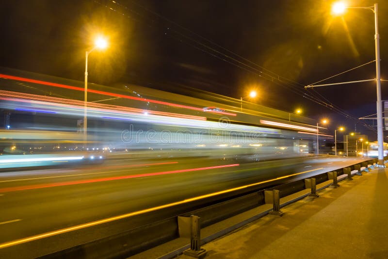 A Blurred Bus Moves Along the Overpass Stock Photo - Image of central ...