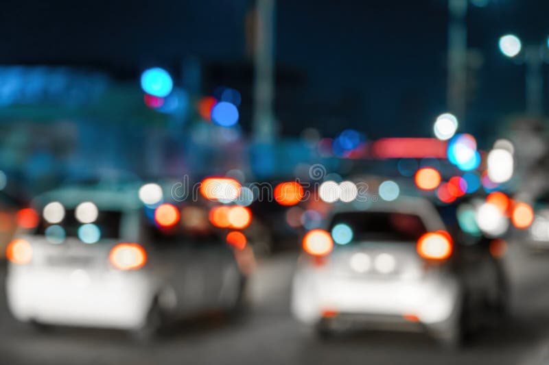 Blurred Car Traffic Light at Night City. Traffic Jam in Evening Rush ...