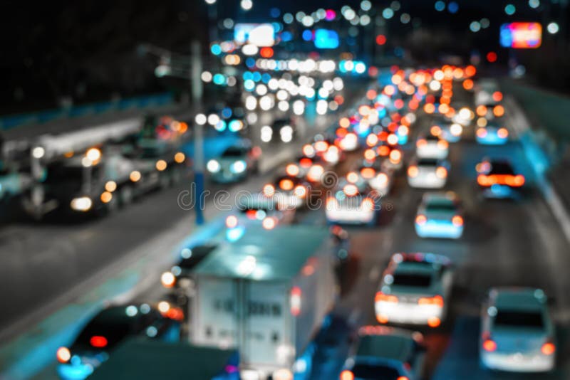 Blurred Car Traffic Light at Night City. Traffic Jam in Evening Rush ...