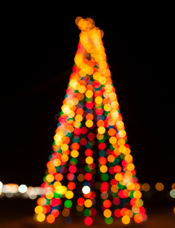 Blurred Christmas Tree Illuminated with Colorful Lights/bokeh Christmas ...