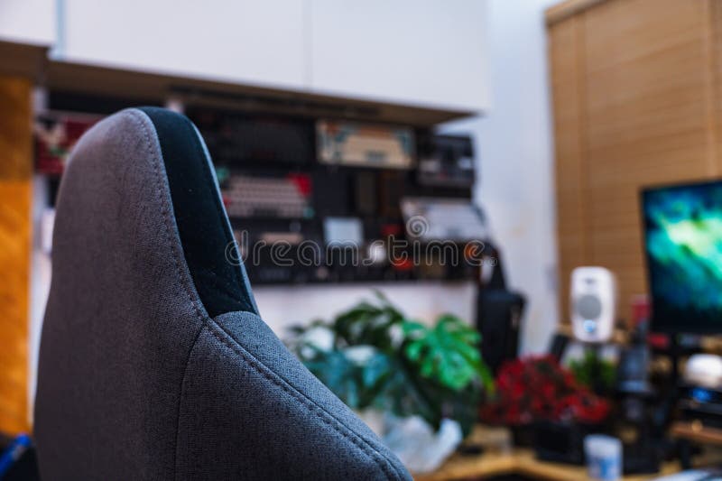 Warm and Blurred Desk Setup with Focus on Technology, Lighting, and ...