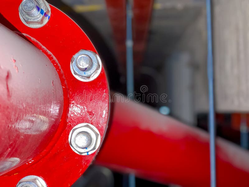 Blurred Fire Pump System with Big Red Pipe Line System Background Stock ...
