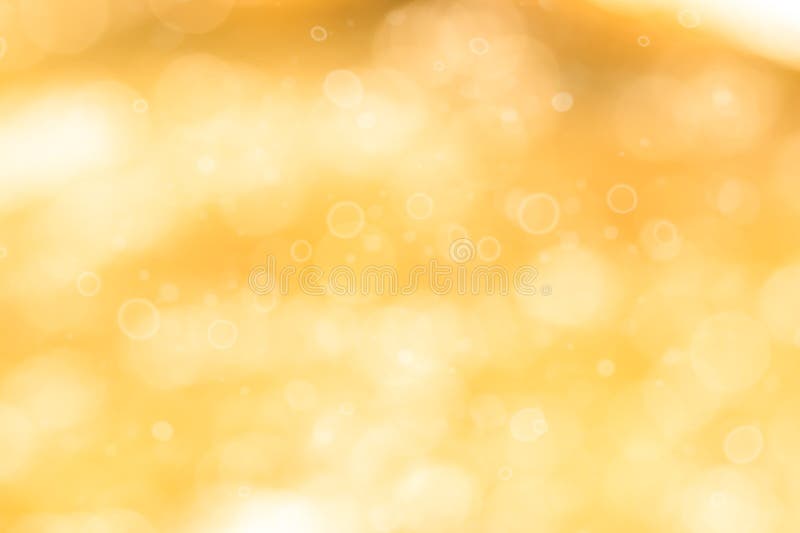 Blurred Gold Sparkles, Light Background. Fading Defocused Yellow Dots ...