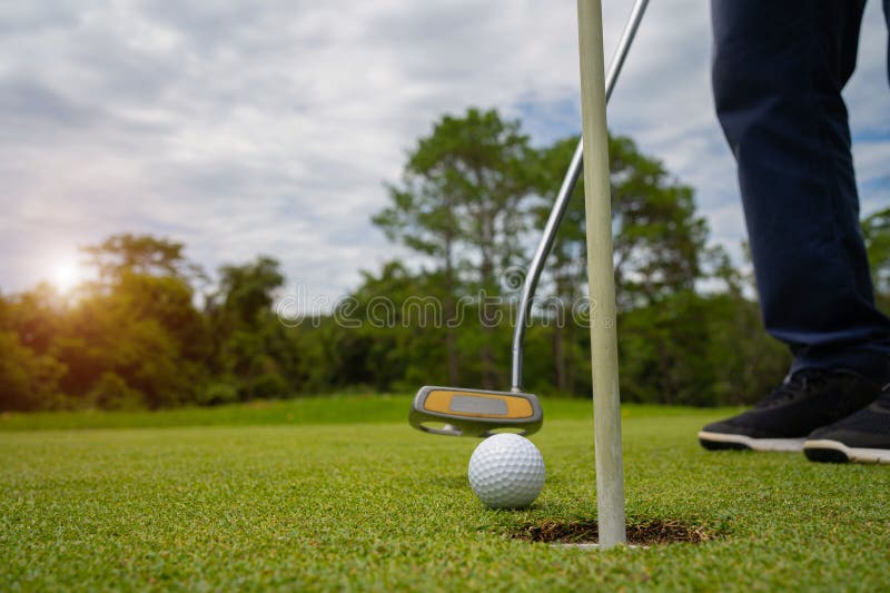 Blurred Golfer Playing Golf in the Evening Golf Course, on Sun Set ...