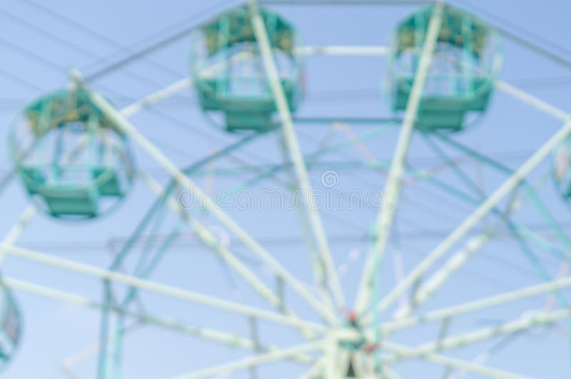 Blurred Green Ferris Wheel in the Park Stock Photo - Image of ...
