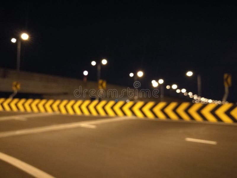 Curve Lane Direction with Caution Sign at the Ramp Stock Image - Image ...