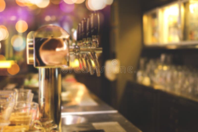 Blurred Image of Bar or Restaurant at Night. Beer Tap As the Mai Stock ...