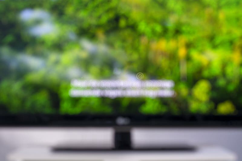 Blurred Image of a Television Screen with a Nature Documentary and ...
