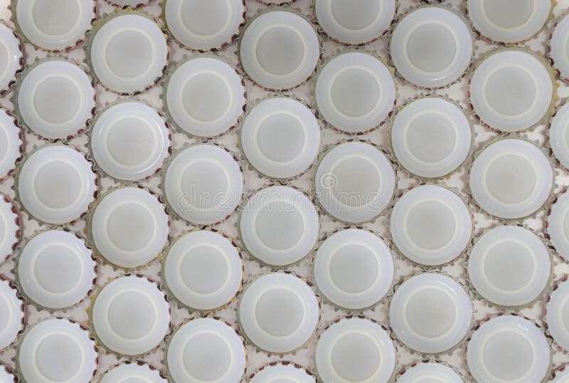 Blurred Images, Many Bottle Cap Patterns Placed Together on a Wh Stock ...