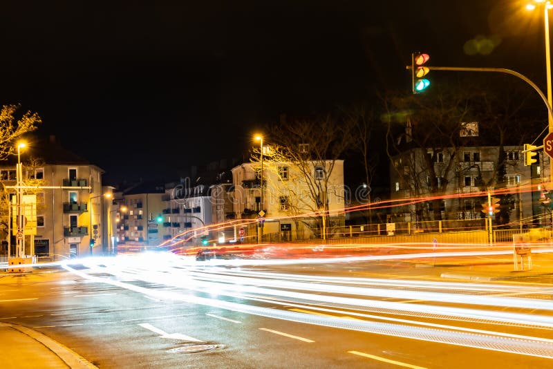 Blurred Light Stripes of Cars on an Intersection at Night Editorial ...
