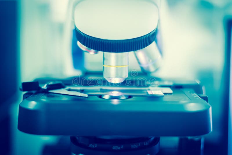 Blurred Microscope in Blue Tone Stock Photo - Image of microscope ...