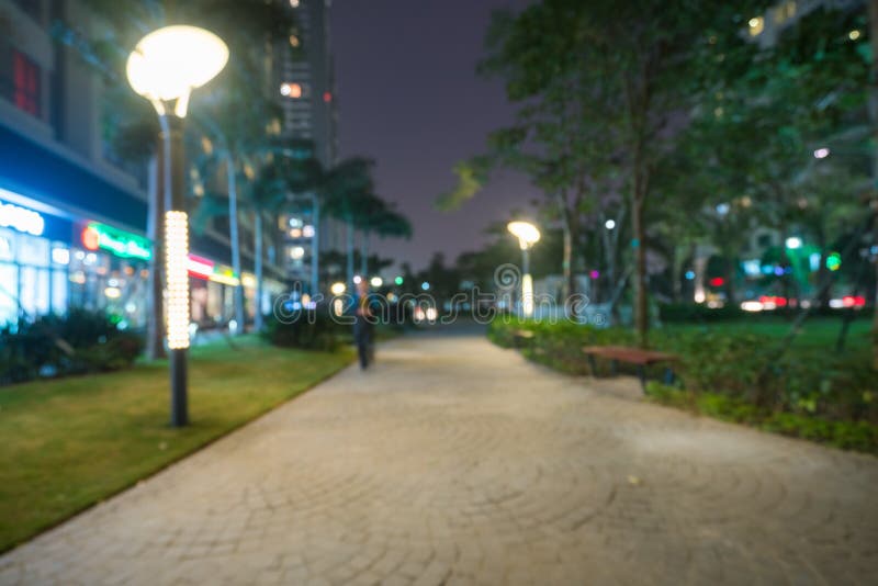 Blurred Modern Urban City at Night with Walking Path Stock Image ...