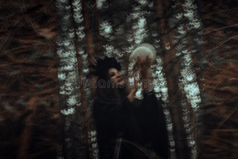 Blurred Reflection in the Mirror of an Evil Scary Witch with the Skull ...