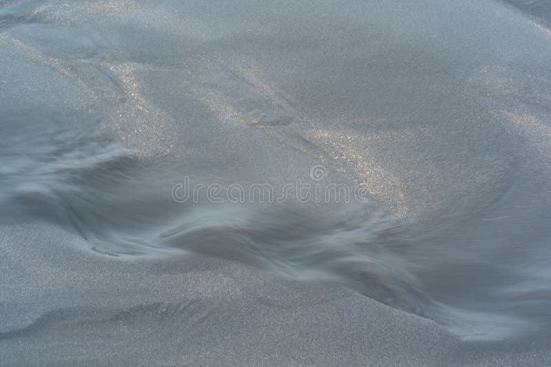 Blurred Natural Background, Water Flows Along the Beach from Black ...