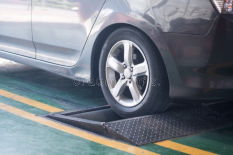 Blurred Photo of the Wheel Check in Workshop Stock Photo - Image of ...
