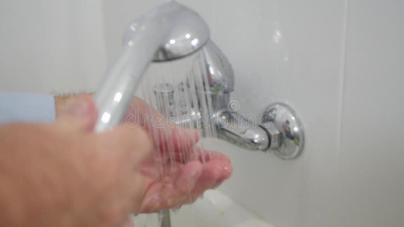 Blurred Shooting with a Person Using the Bathroom Showerhead. Man ...