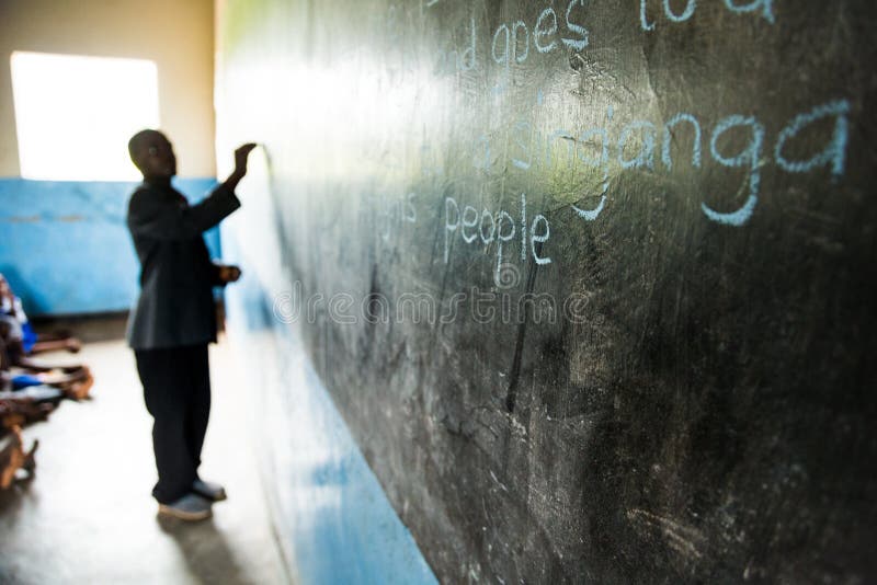 Blurred Shot of a Person Writing on the Blackboard Stock Image - Image ...