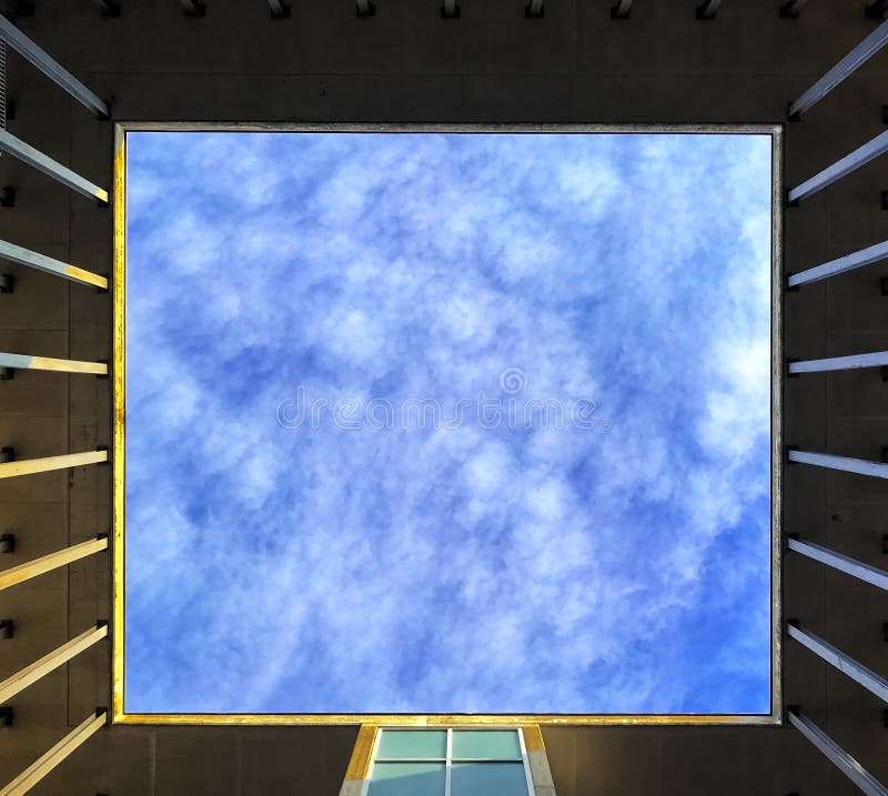 Blurred Sky and Clouds Seen through a Square Window Frame Used As ...