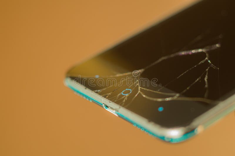 Blurred Smartphone with Broken Display Glass. Cracked Screen Glass ...