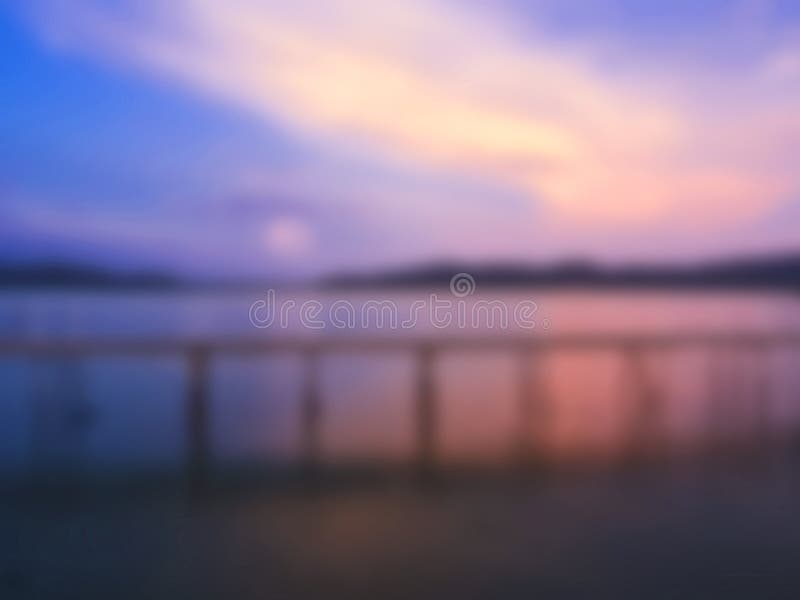 Blurred Sunset at the Beach Stock Image - Image of clouds, scenery ...