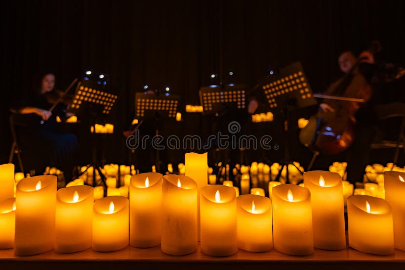 Blurred Symphonic Orchestra on Stage with Lots of Candles Stock Photo ...