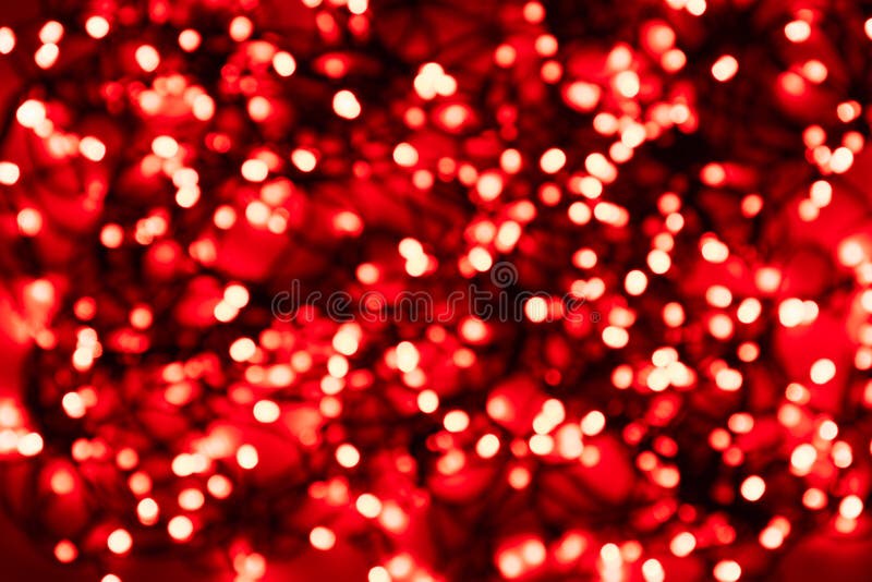 Blurred Tangled Wire Garlands with Red Light Bulbs on a Red Background ...