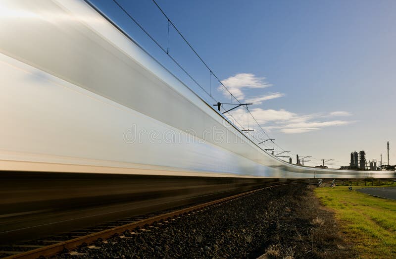 A Blurred Time Lapse of a Train Travelling Across the Frame on a Curve ...