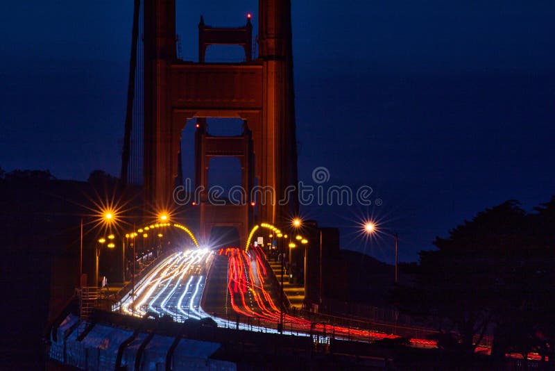 Blurred Traffic Driving through Golden Gate Bridge at Night Stock Image ...